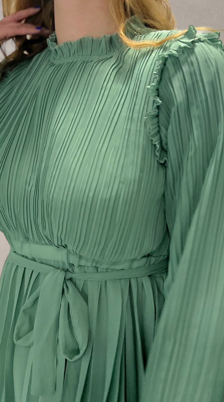 The Best Fabrics for Pleated Dresses and How to Care for Them | Vogue Vocal